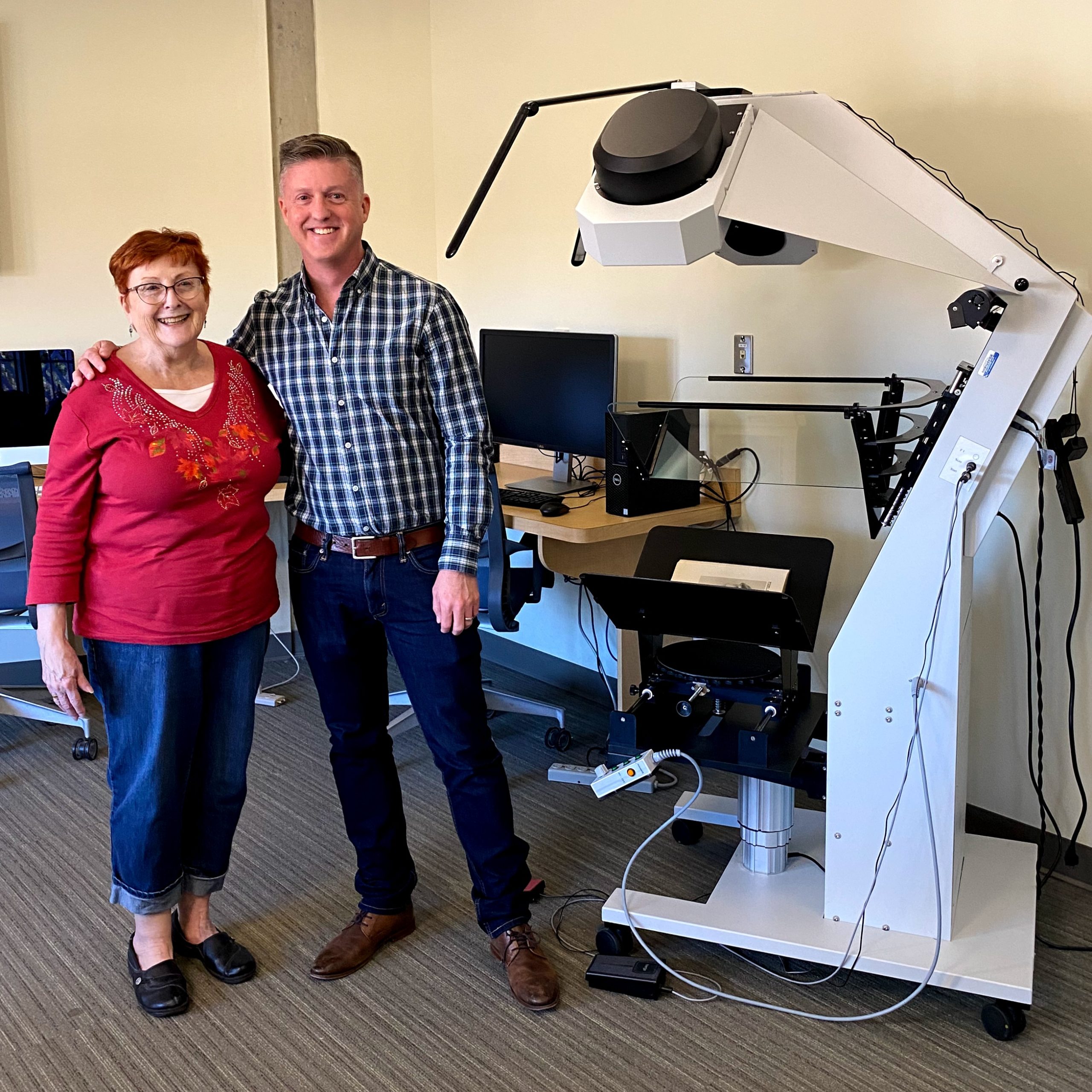 sean and mom in library - Giving to Mary Washington
